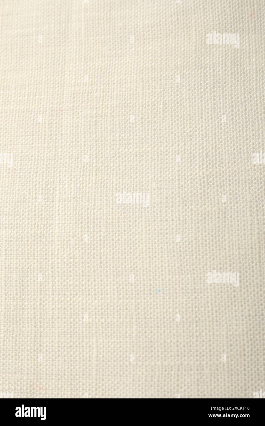 Texture of pale yellow fabric as background, top view Stock Photo - Alamy