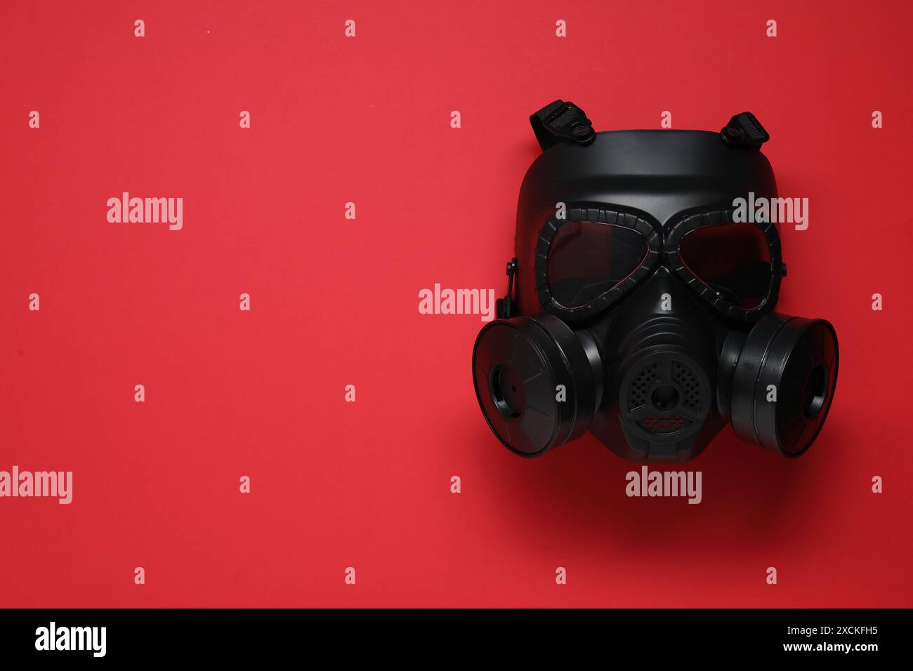 One gas mask on red background, top view. Space for text Stock Photo ...