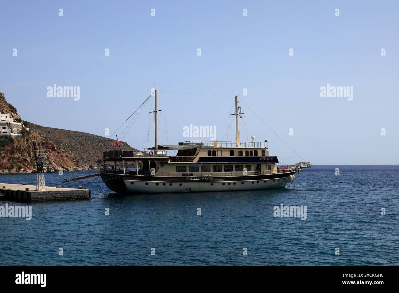 The Love Boat tourist trip boat at Livadia Harbour, Tilos Island ...