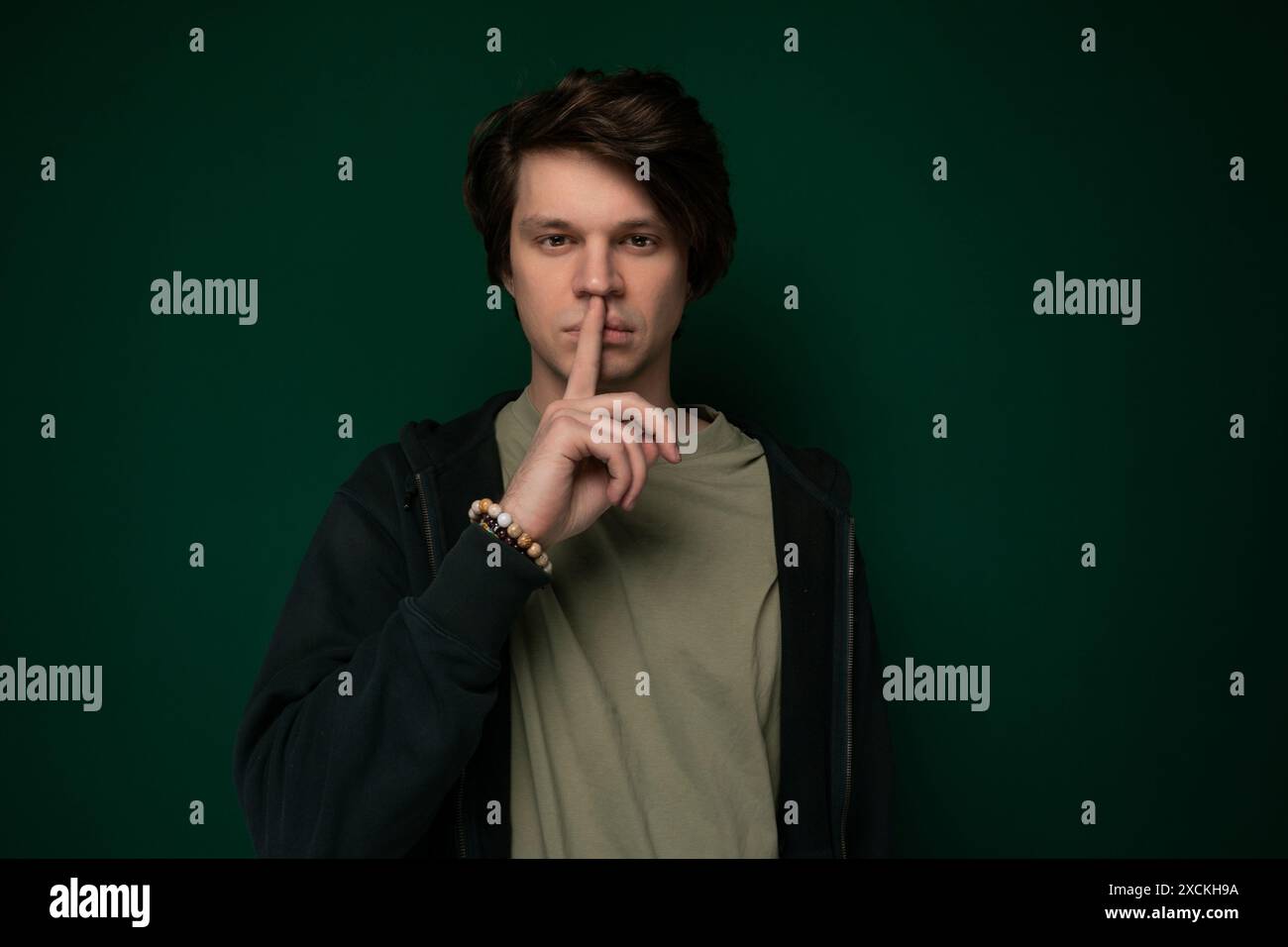 Concealed gesture hi-res stock photography and images - Alamy