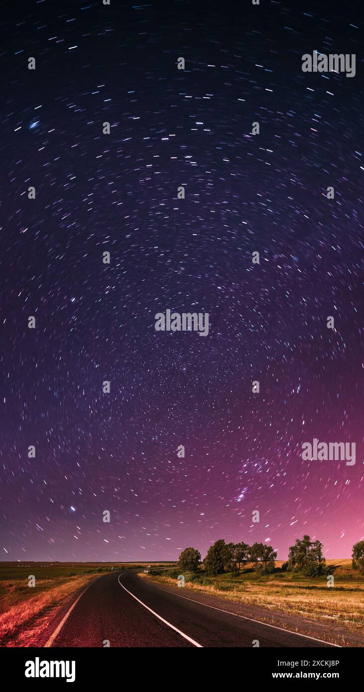 Blue Night Starry Sky Above Country Asphalt Road In Countryside And ...