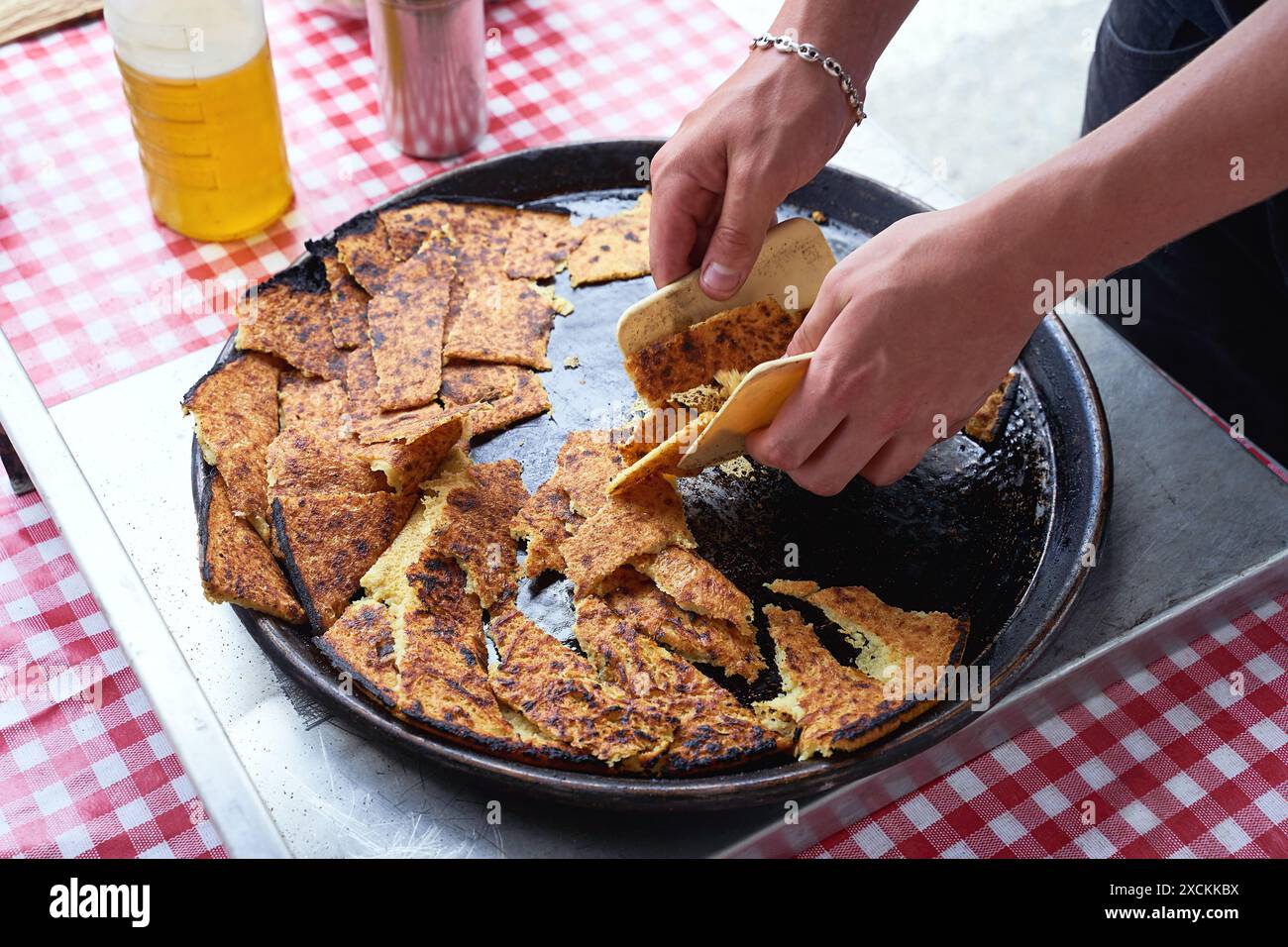 Socca, just coming out of the oven, in Nice, the French Riviera ...