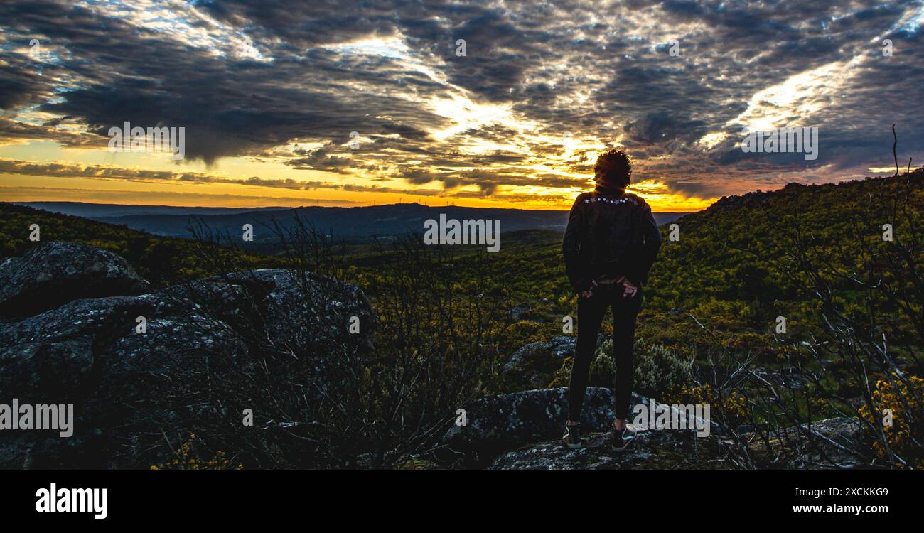 Human silhouette at sunset Stock Photo - Alamy