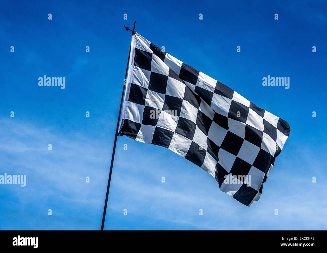 Chequered flag flying hi-res stock photography and images - Alamy
