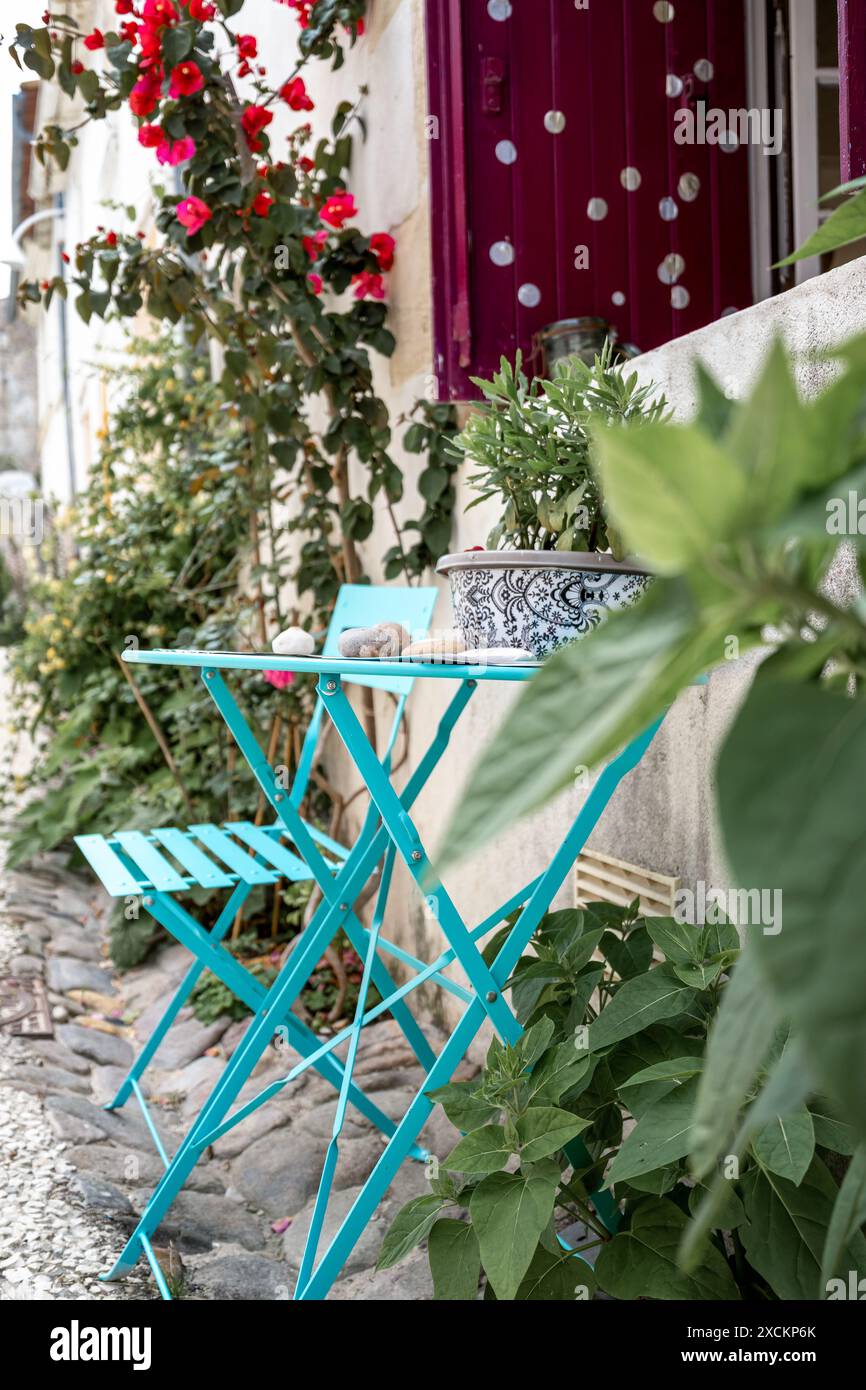 Outdoor cafe on a street of typical french traditional village in ...