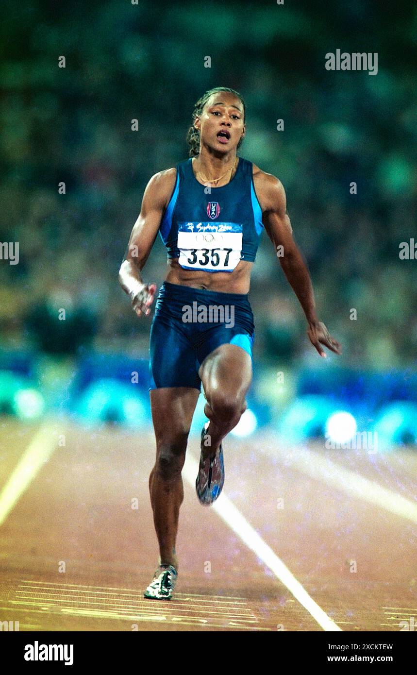 Marion Jones (USA) wins the gold medal in the women's 100m at the 2000 ...