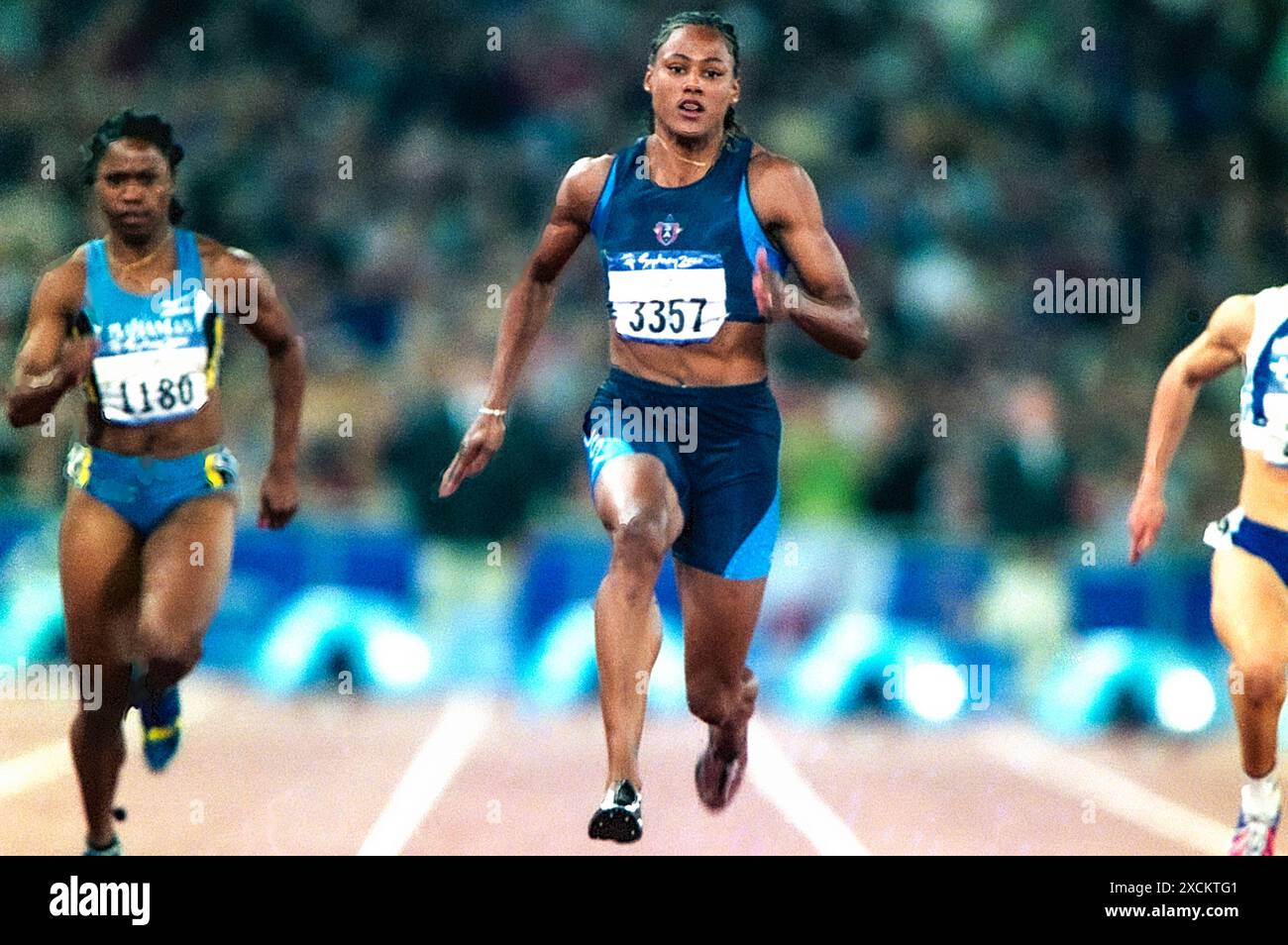 Marion Jones (USA) wins the gold medal in the women's 100m at the 2000 ...
