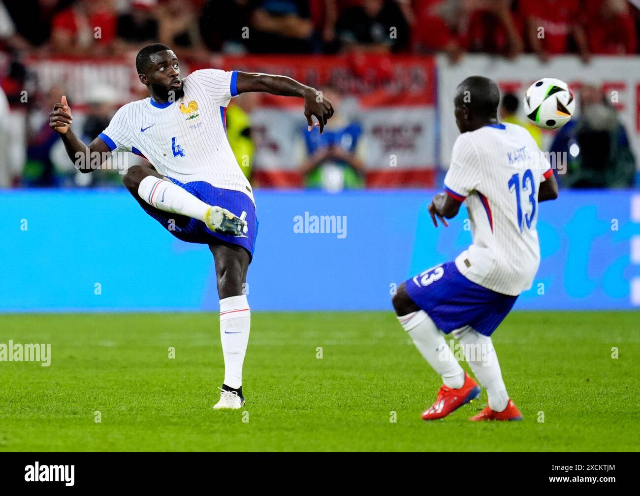 France's Dayot Upamecano (left) in action during the UEFA Euro 2024 ...