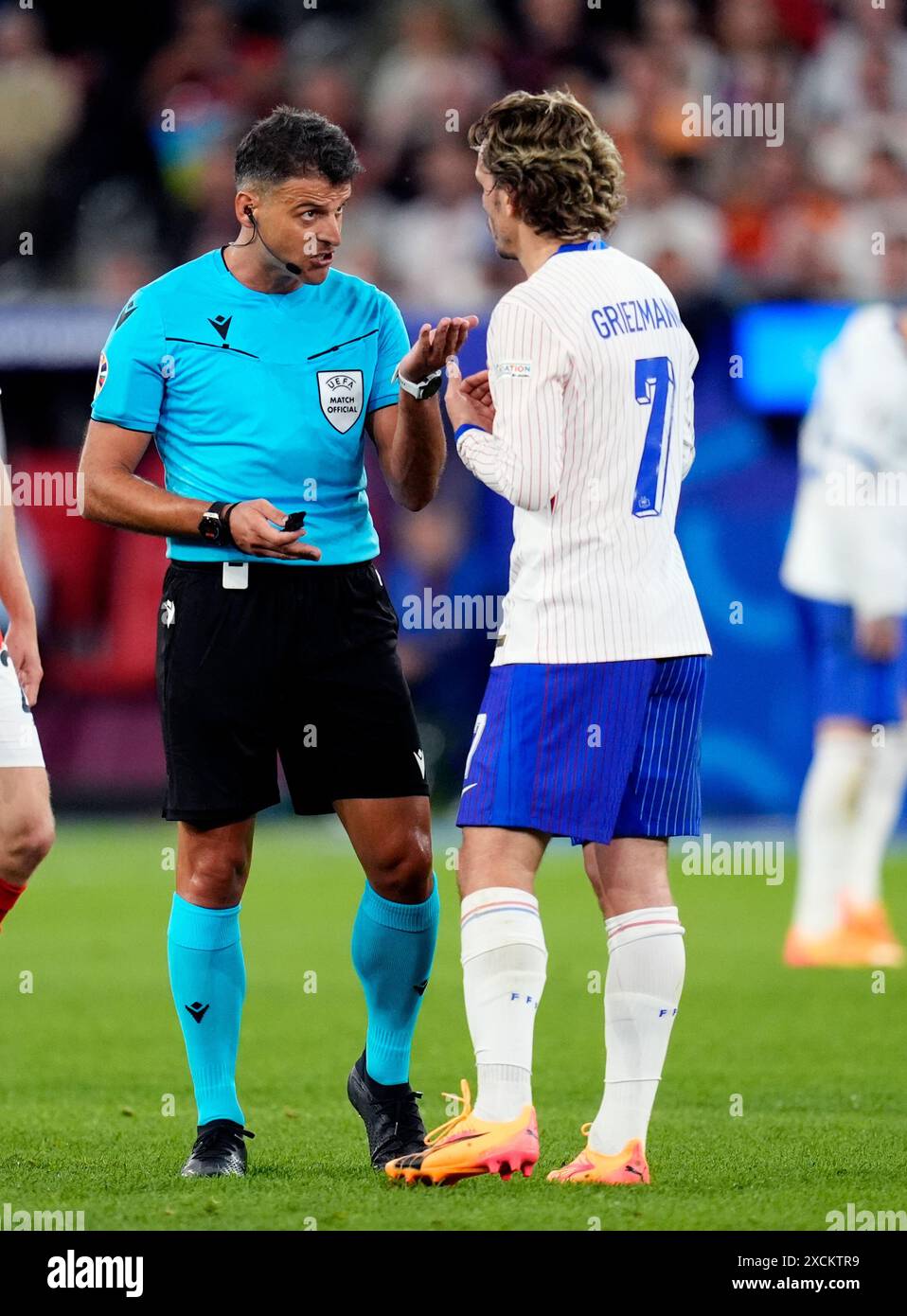 Referee Jesus Gil Manzano speaks to France's Antoine Griezmann during ...
