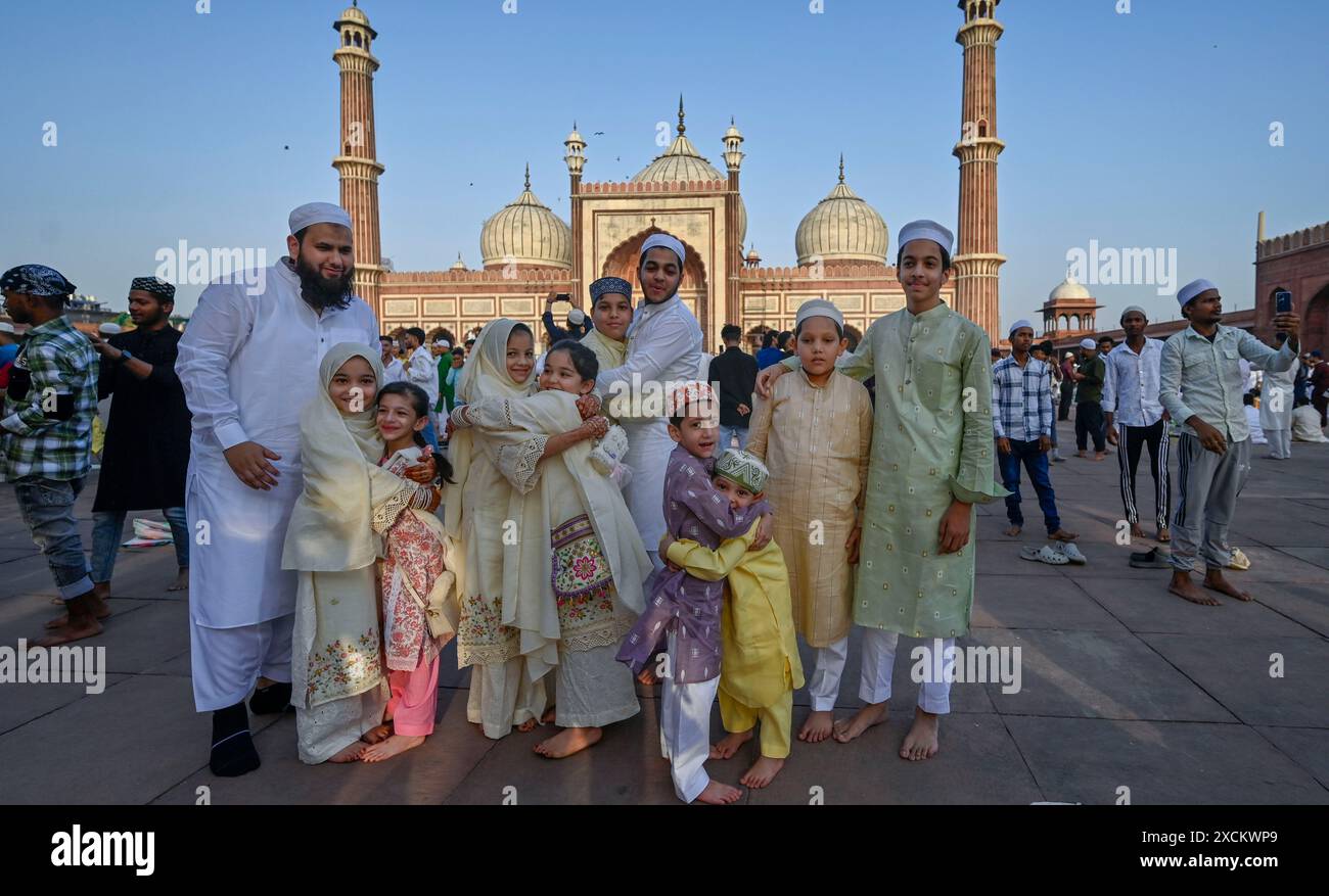 NEW DELHI, INDIA - JUNE 17: Muslims embrace after offering Eid al-Fitr ...