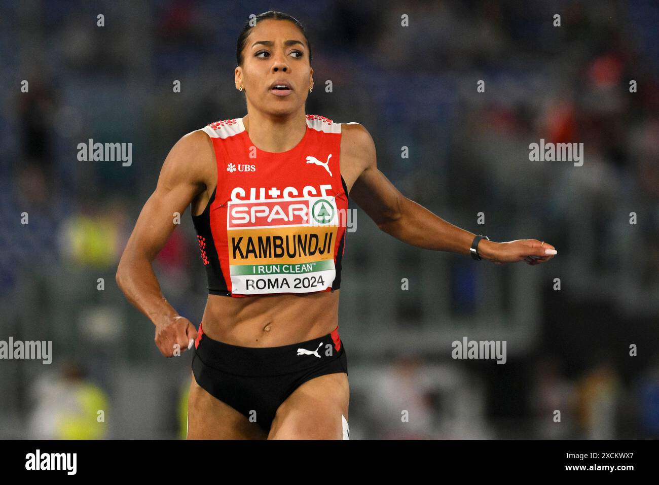 Mujinga Kambundji of Switzerland competes in the 200m women semifinal ...