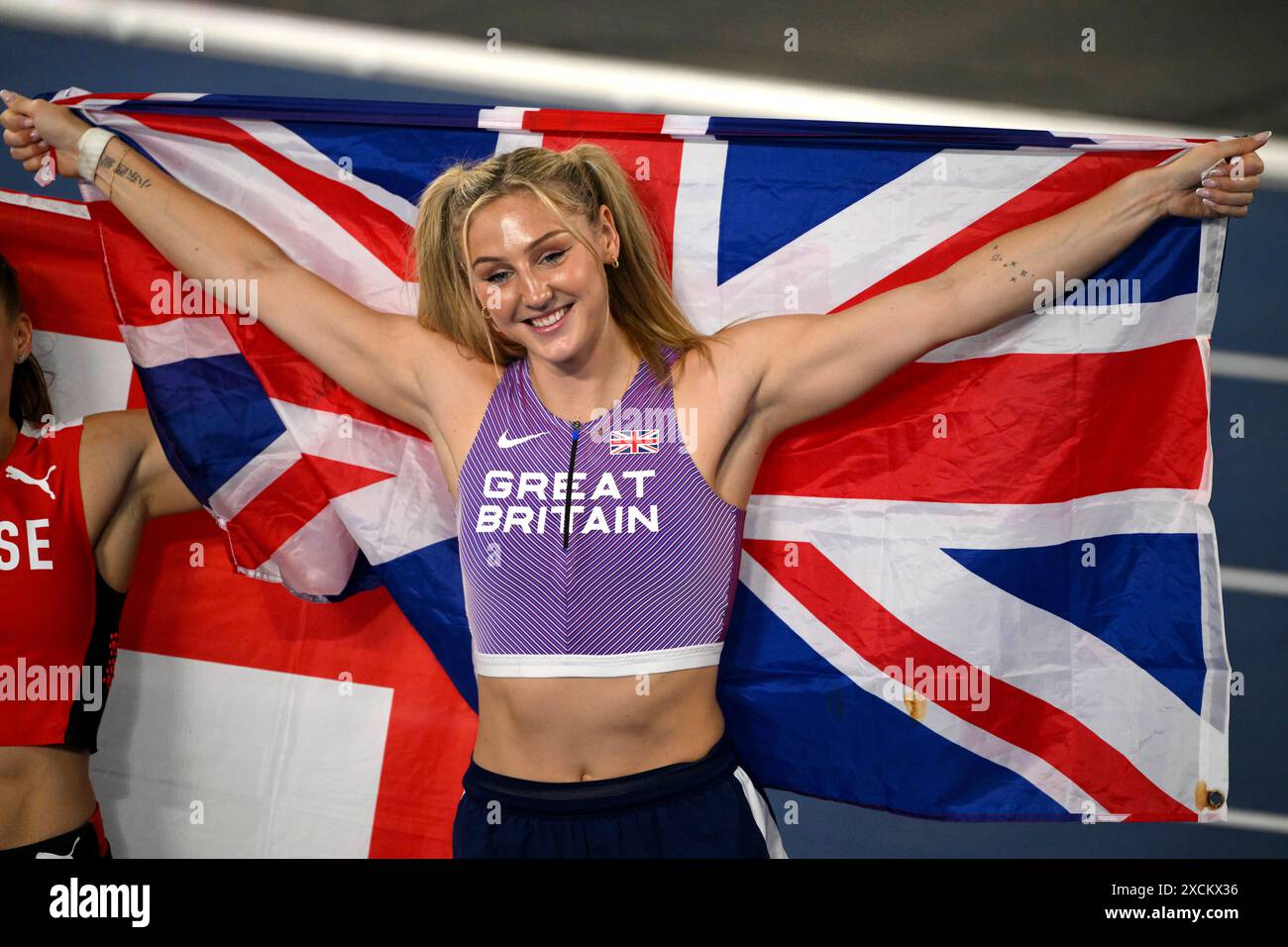 Molly Caudery of Great Britain celebrates after competing in the pole ...