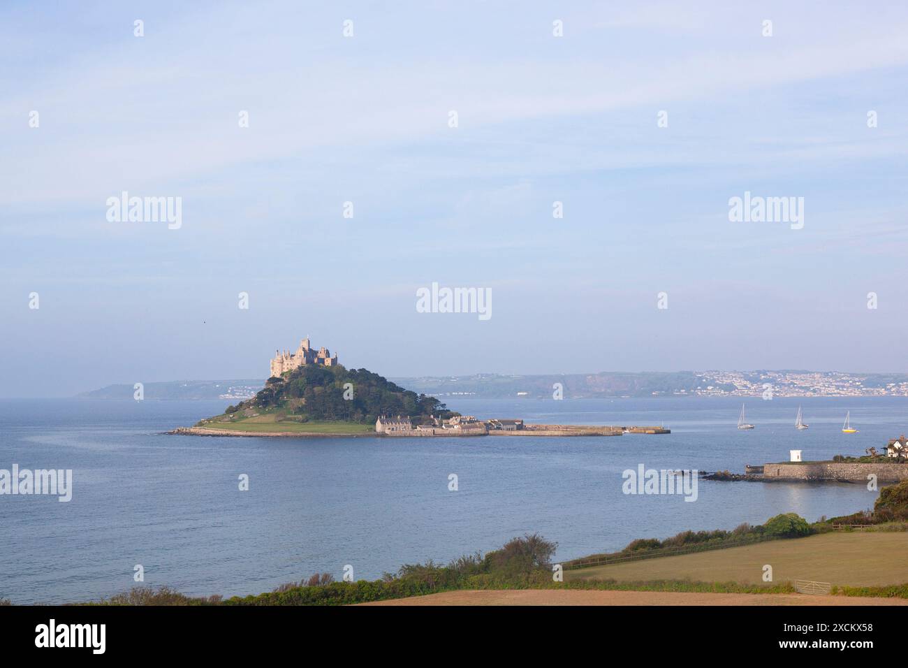 Early morning sunshine over St Michael's Mount; castle; Mount's Bay ...