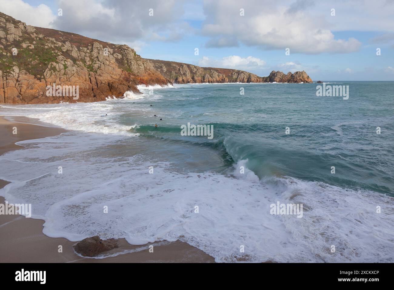 High tide at Porthcurno Beach; Logan's Rock, Cornwall Stock Photo - Alamy