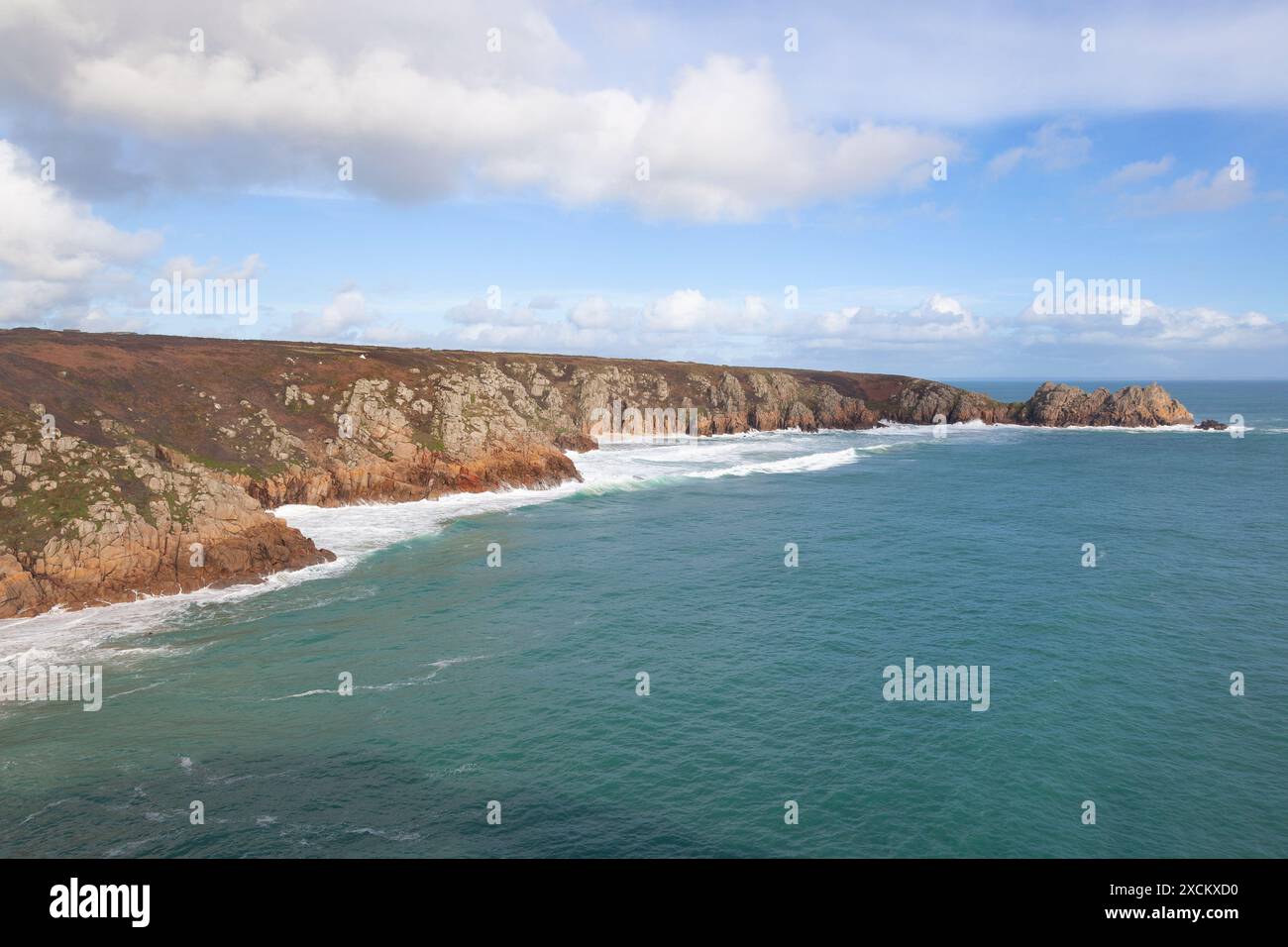 High tide at Porthcurno Beach; Logan's Rock, Cornwall Stock Photo - Alamy
