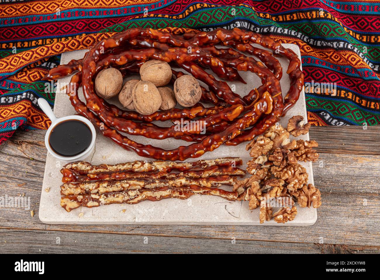 Walnut sucuk. Turkish natural dried fruit pulp with walnut sausage ...