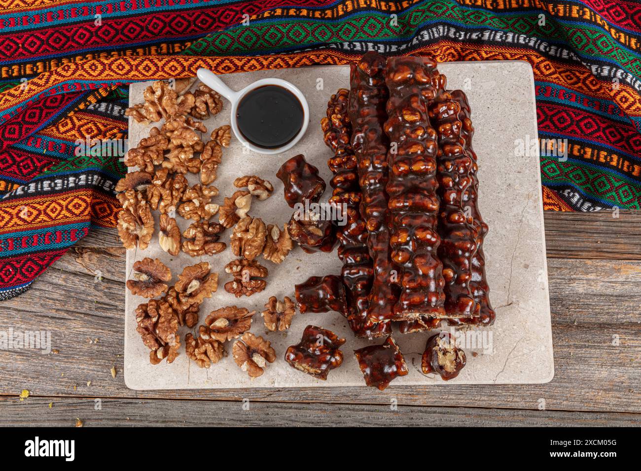 Walnut sucuk. Turkish natural dried fruit pulp with walnut sausage ...