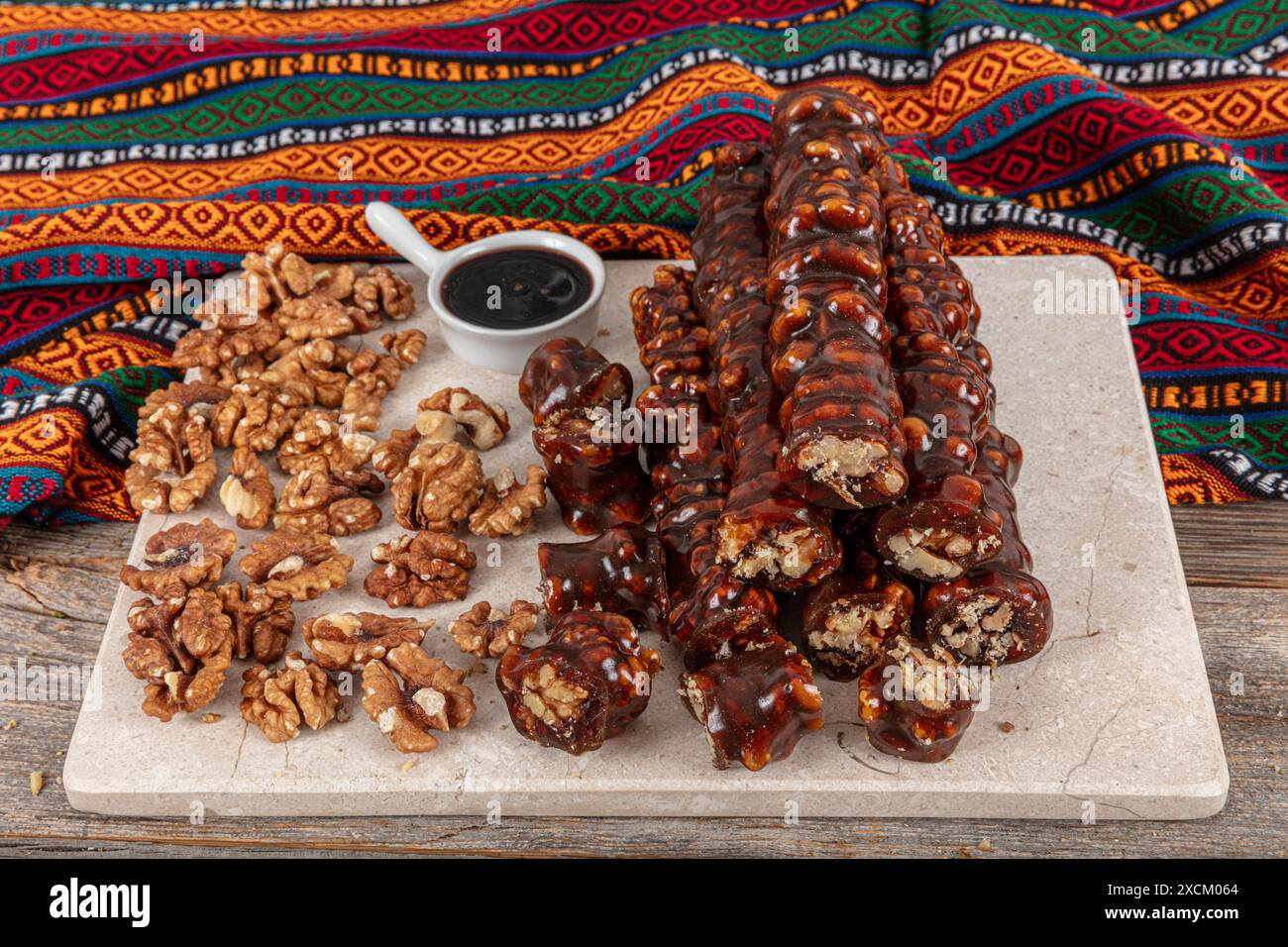 Walnut sucuk. Turkish natural dried fruit pulp with walnut sausage ...