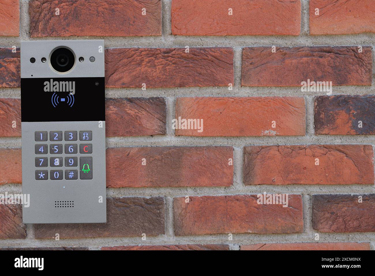 Doorbell Intercom on Brick Wall Stock Photo - Alamy