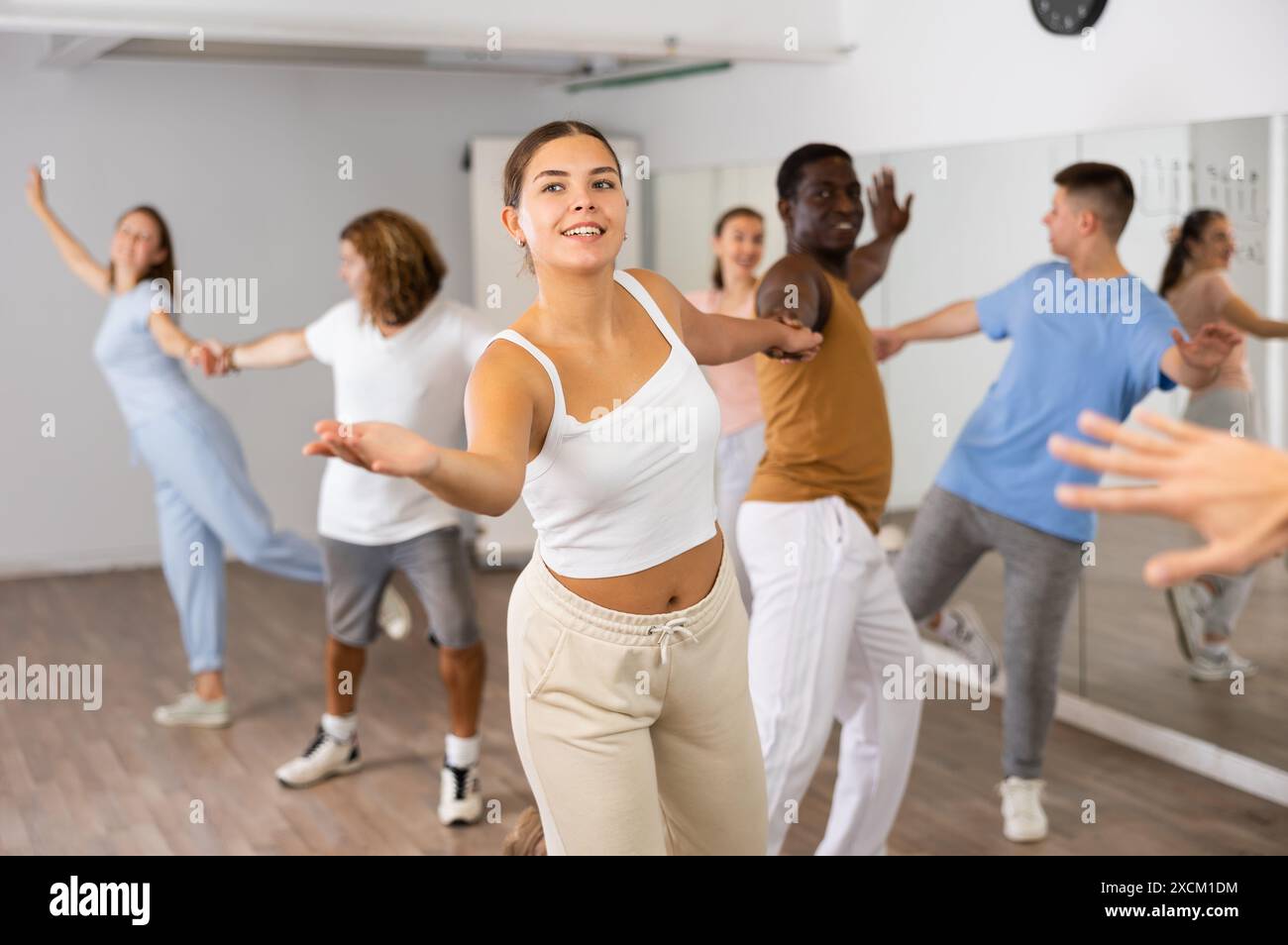 Adult couples dancing active dance together in studio Stock Photo - Alamy
