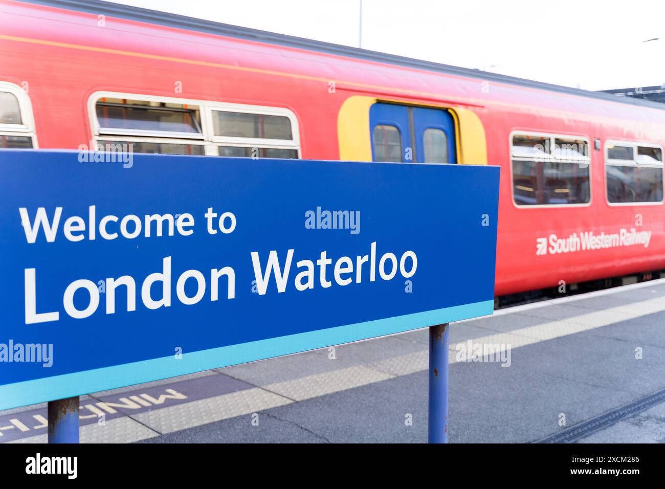 Signage board for "Welcome to London Waterloo" in white letter on ...