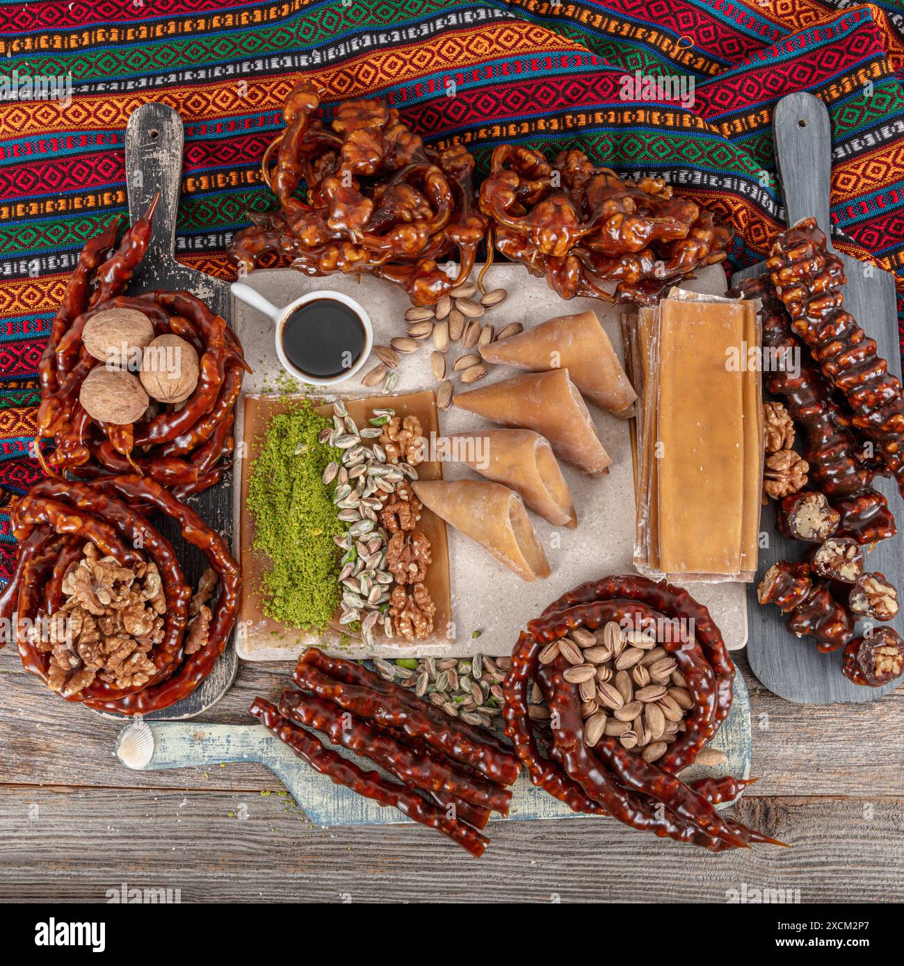 Turkish cuisine various snacks. Walnut sausage, pistachio sausage and ...
