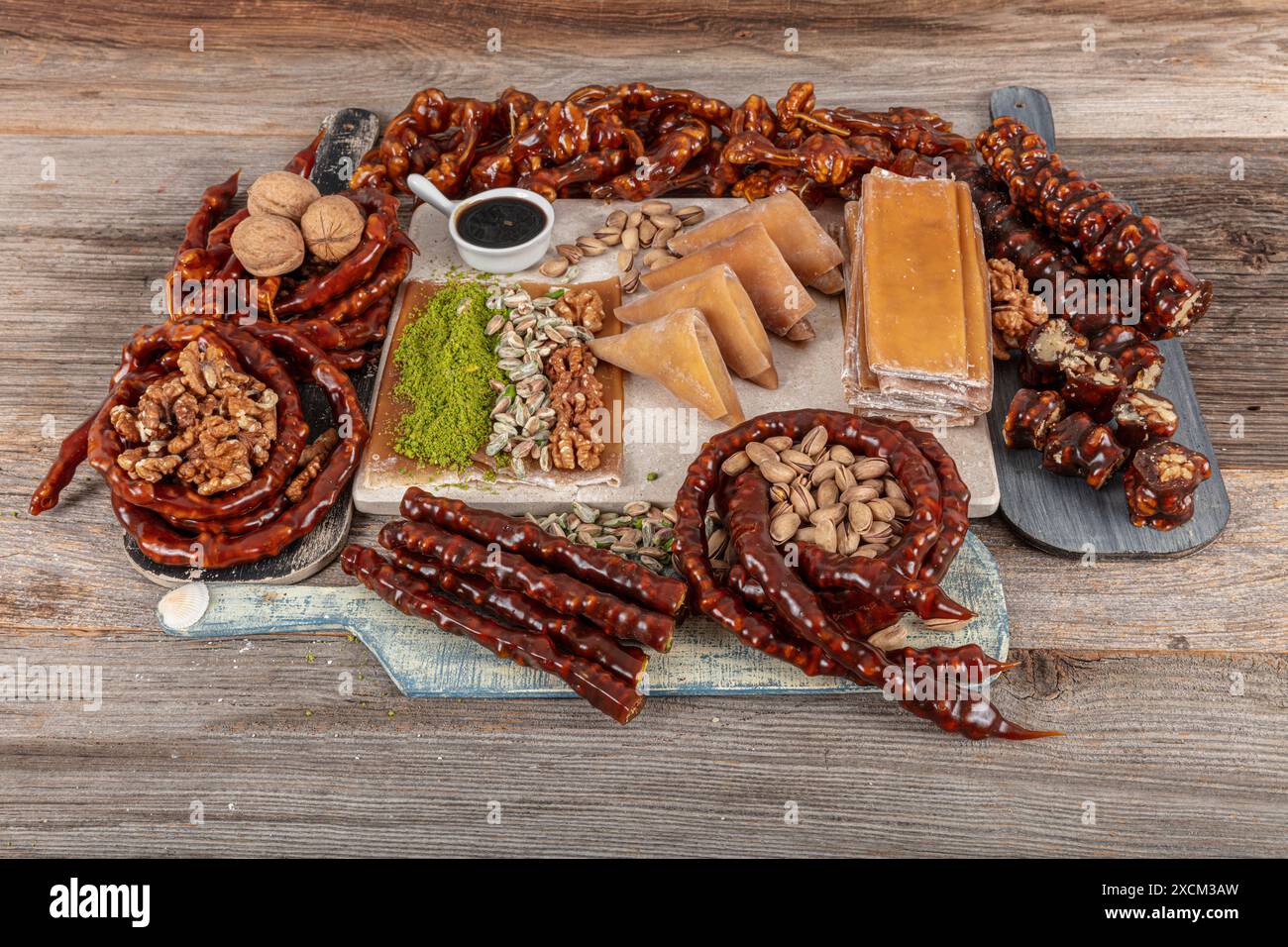 Turkish cuisine various snacks. Walnut sausage, pistachio sausage and ...