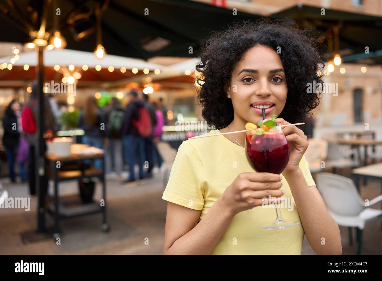 Woman sipping through straw hi-res stock photography and images - Alamy