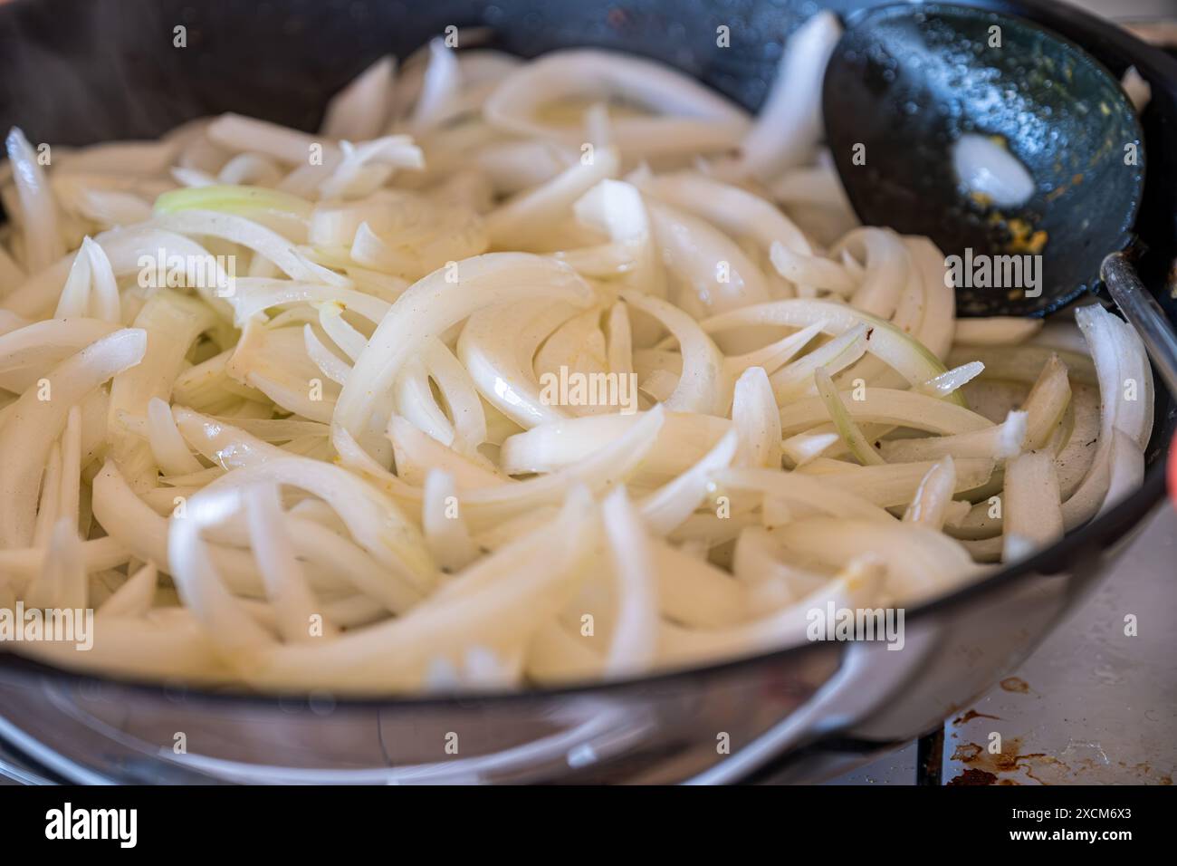 the preparation and cooking process of onions, highlighting various ...