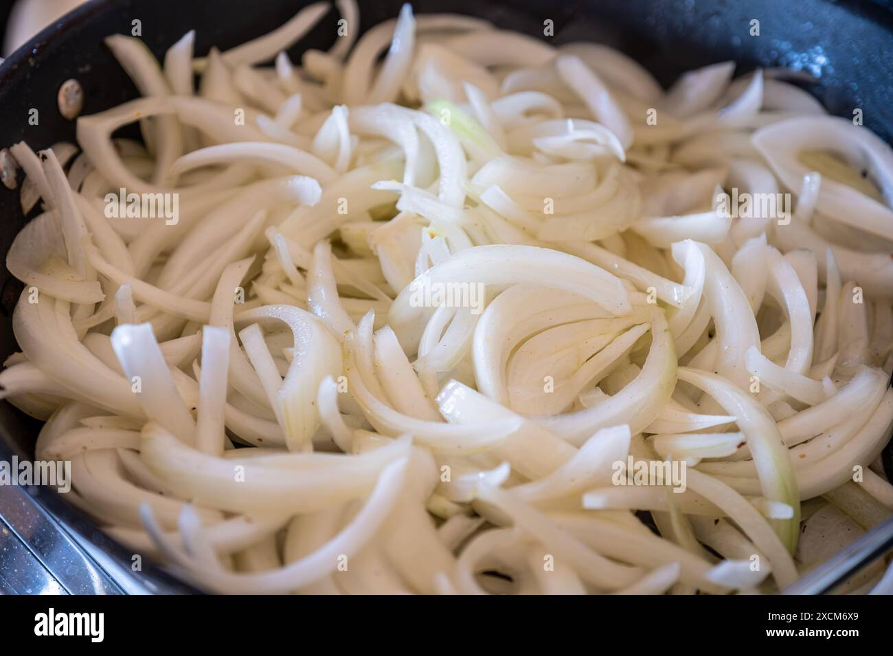 the preparation and cooking process of onions, highlighting various ...