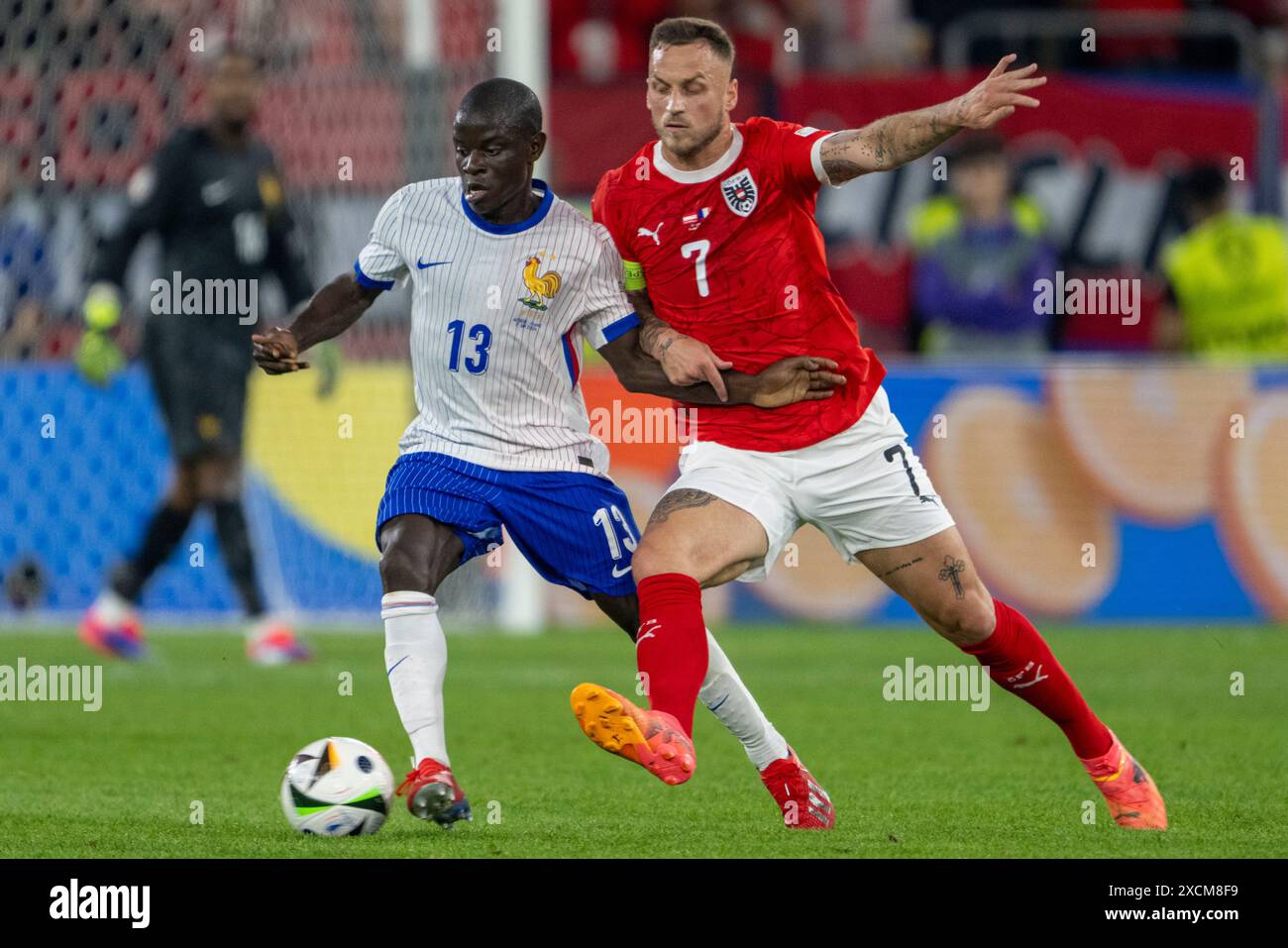 Dusseldorf, Germany. 17th June, 2024. N'Golo Kante of France and Marko ...