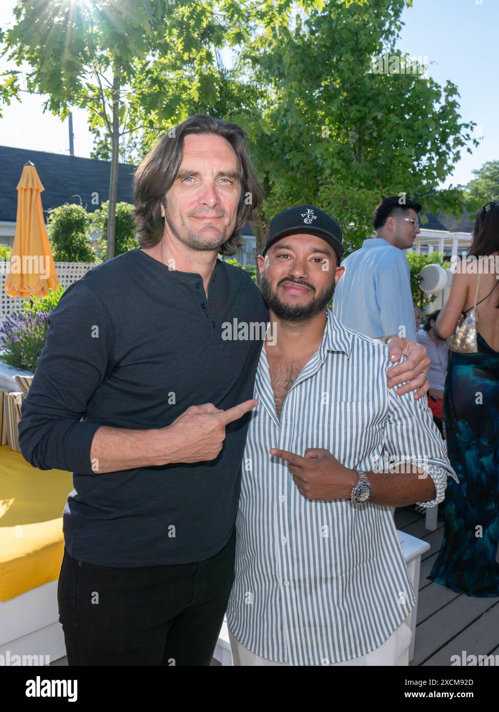 Jamie Mulholland and guest attends the Opening of Ketchy Beach at Capri ...