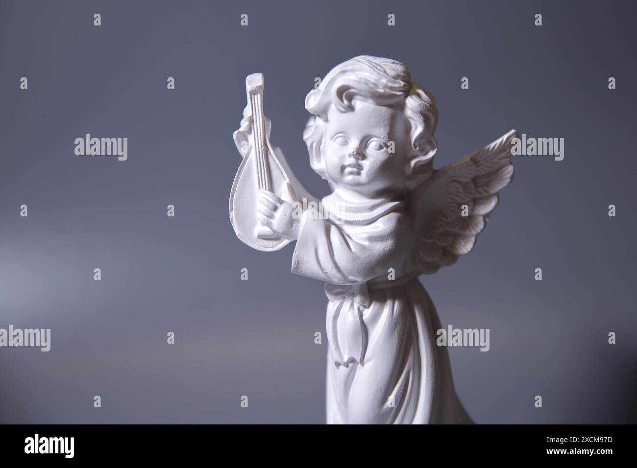 Angel with musical instrument hi-res stock photography and images - Alamy