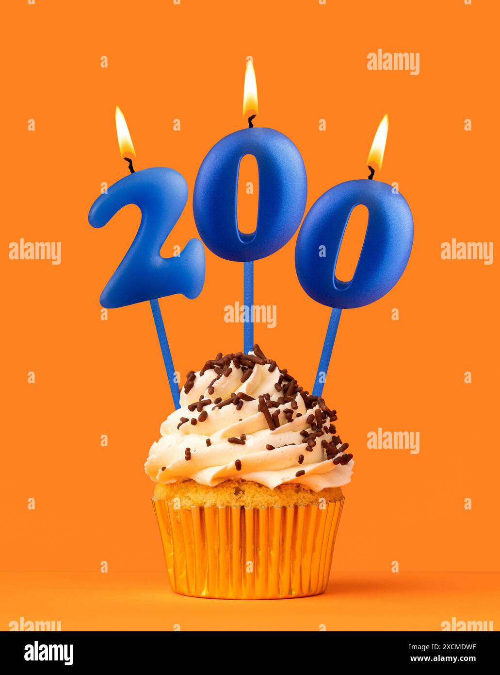 Blue birthday candle and cupcake - Number 200 Stock Photo - Alamy