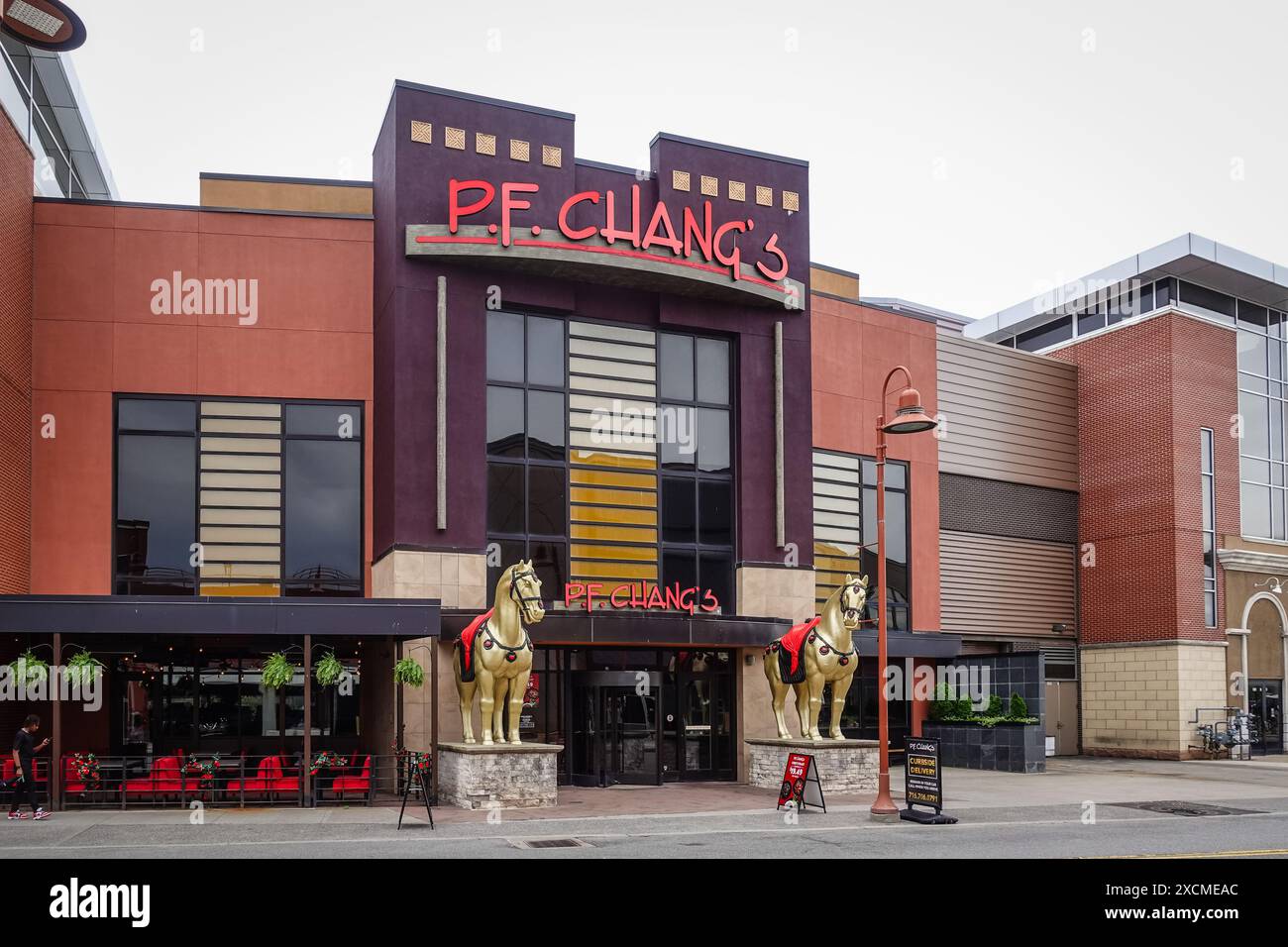 External view of P.F. Chang's restaurant entrance, featuring horse ...