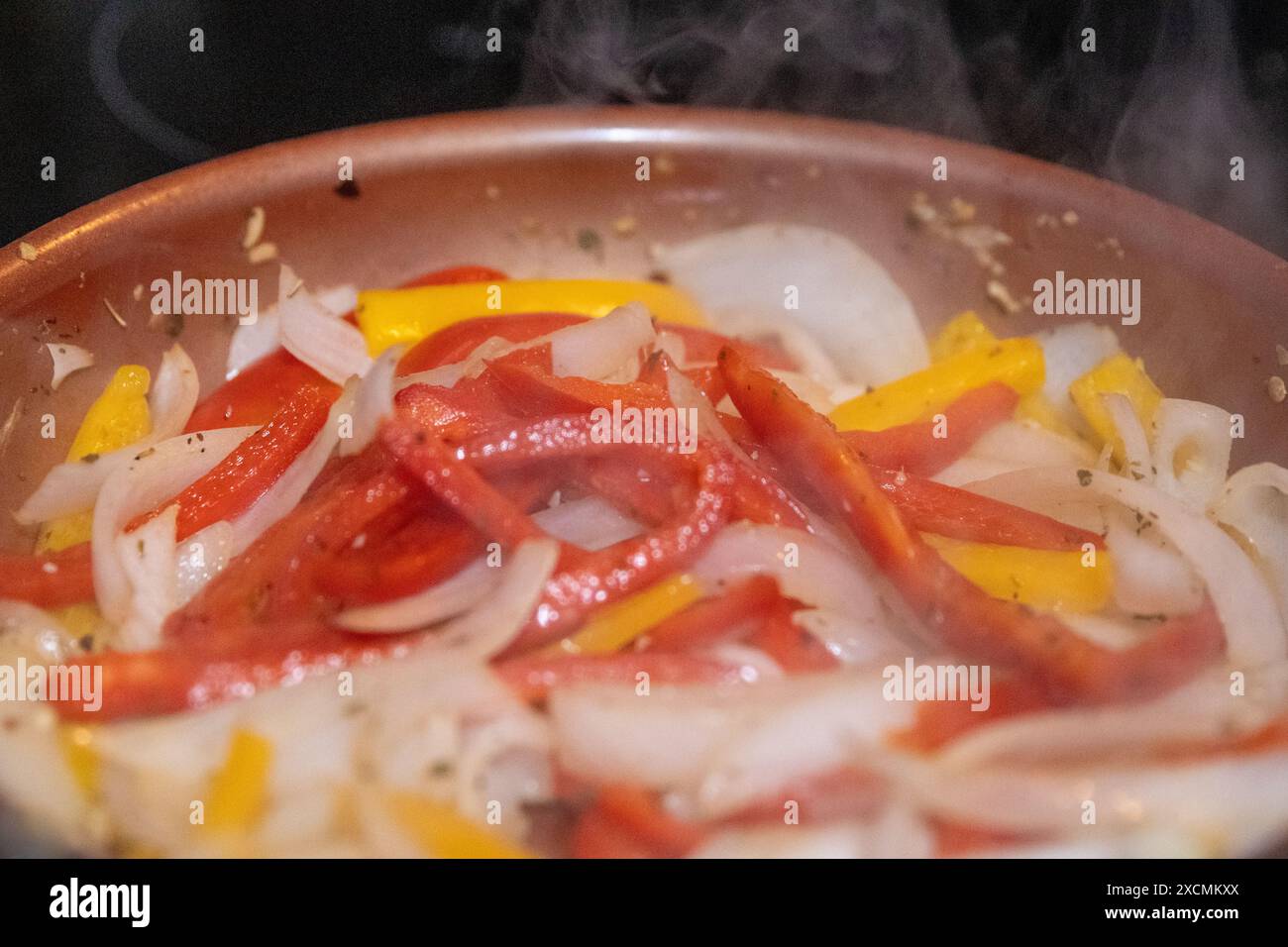 Fresh peppers onions cooked hi-res stock photography and images - Alamy