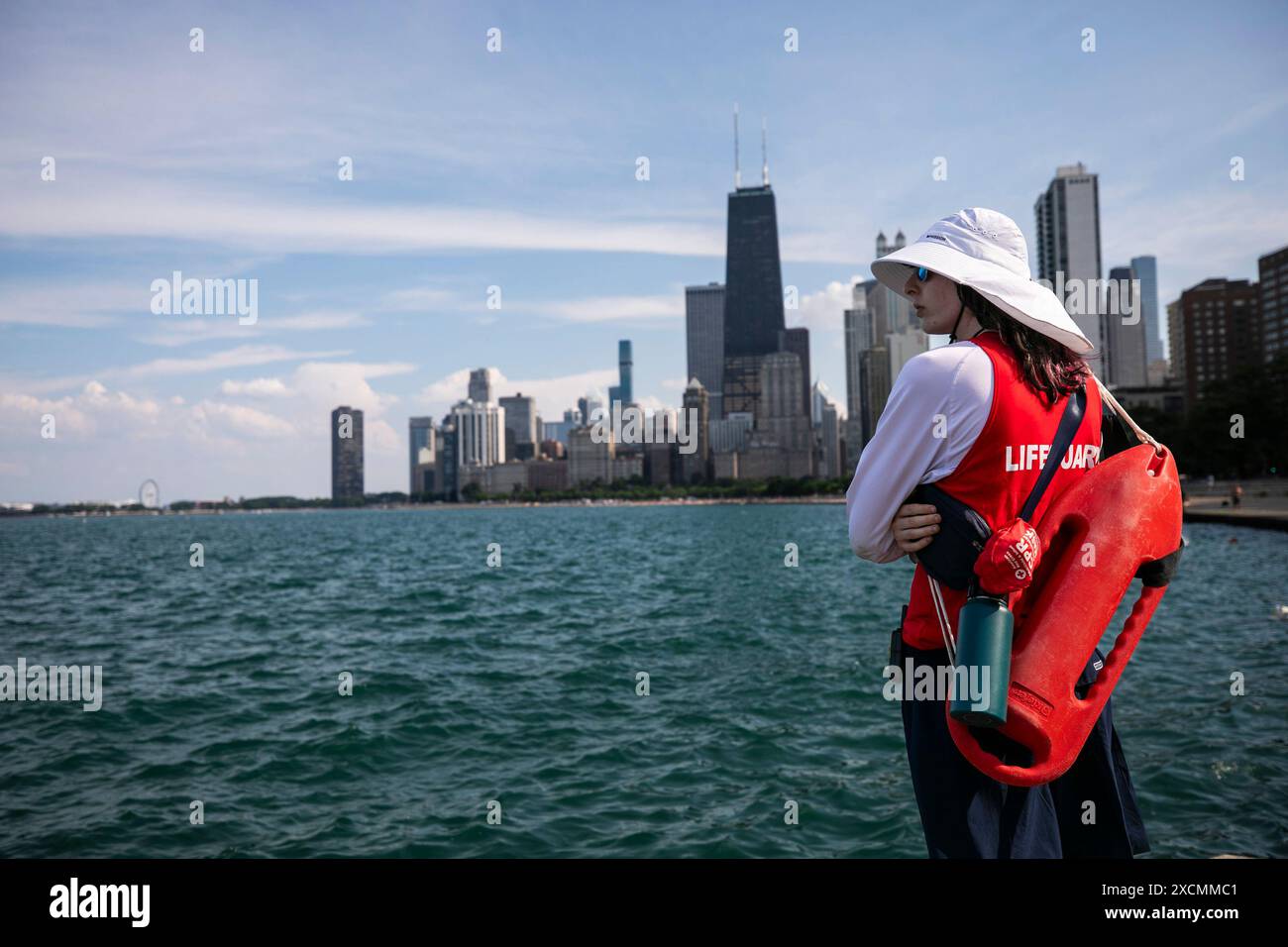 Chicago, USA. 17th June, 2024. A lifeguard keeps an eye out along a ...