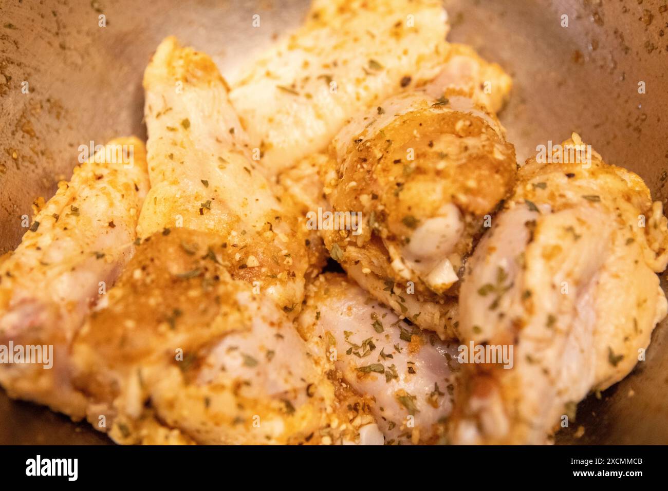 Seasoned Raw Chicken wings to be air fried Stock Photo - Alamy