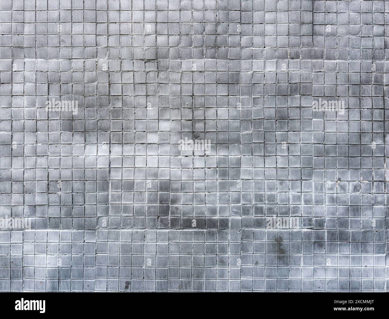 old weathered tiles wall texture. urban background painted in gray ...