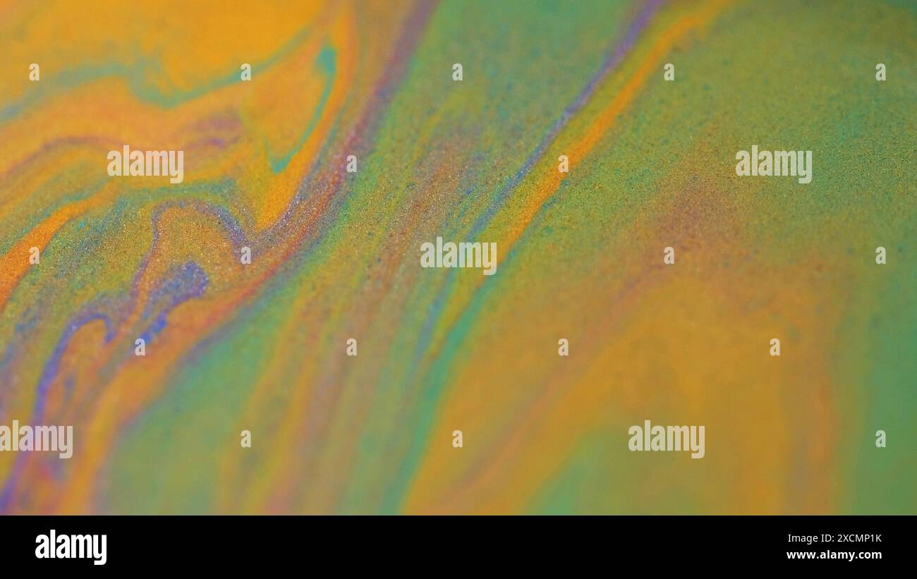 Liquid glitter mix. Marble paint. Blur orange purple green color ...