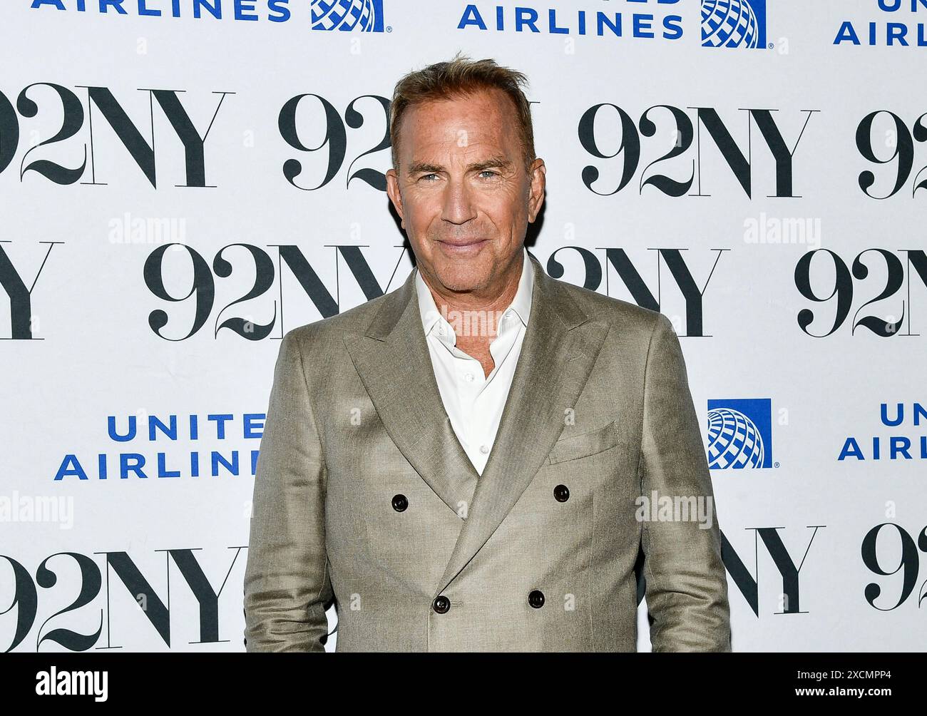 Kevin Costner poses backstage before discussing the film series ...