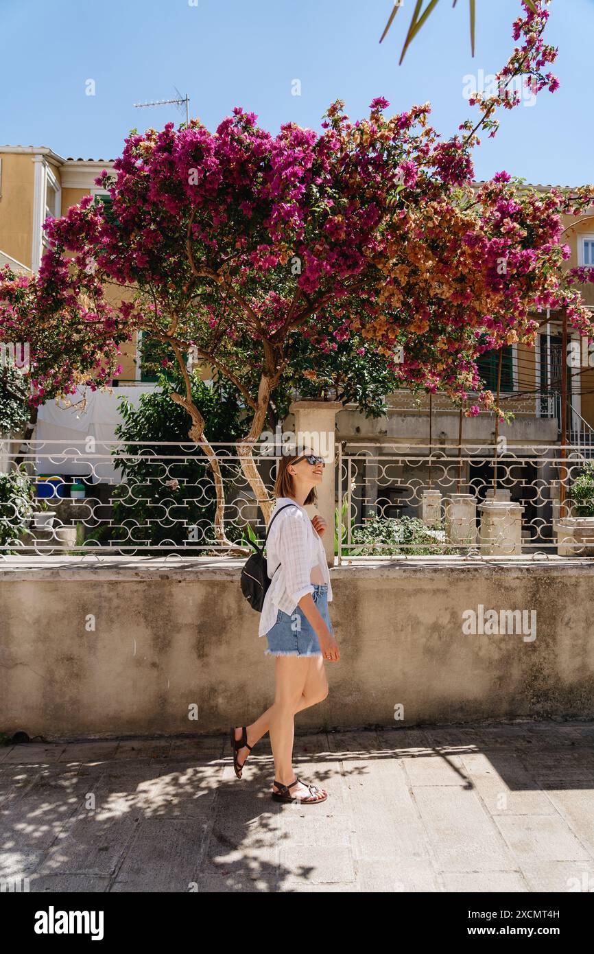 Tranquil woman strolling on street hi-res stock photography and images ...