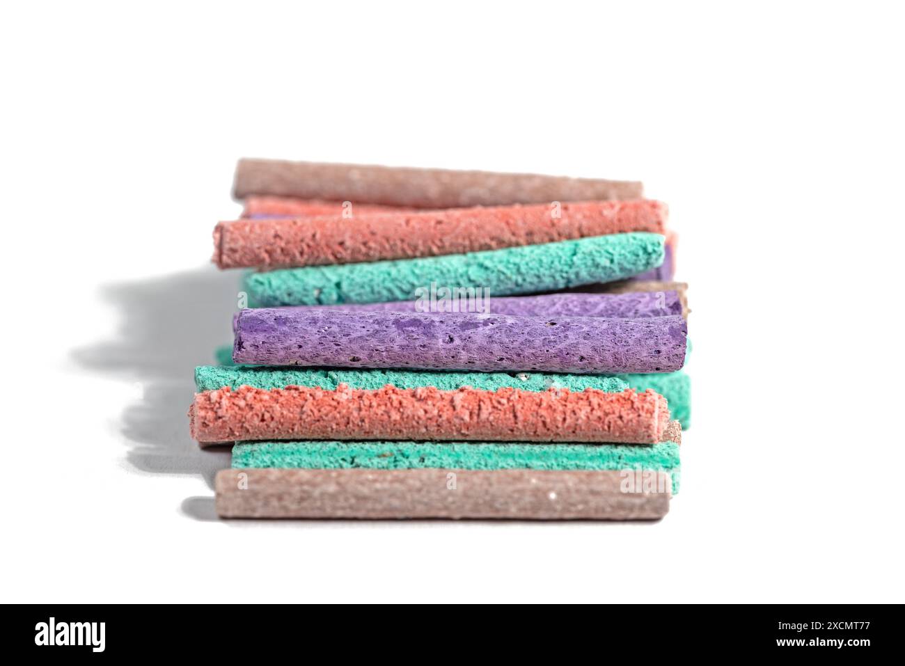 Colorful fertilizer sticks against a white background Stock Photo - Alamy