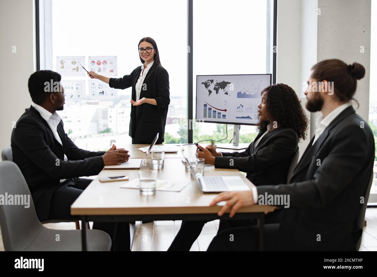 Multicultural employees meeting board hi-res stock photography and ...