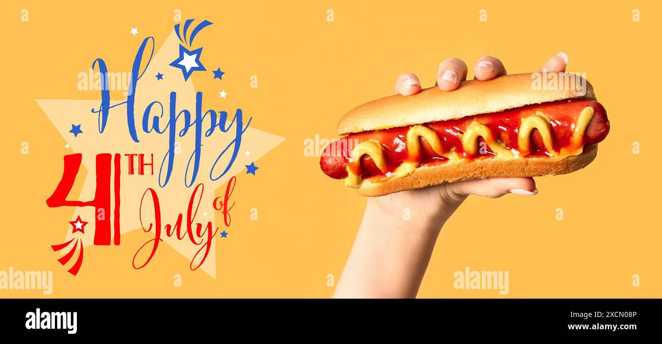 Hand holding tasty hot dog with mustard and ketchup on beige background ...