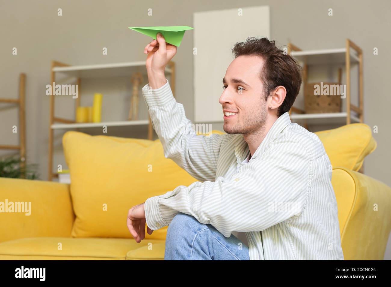 Man throwing paper plane hi-res stock photography and images - Alamy