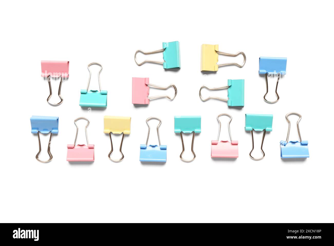 Colorful binder clips on white background Stock Photo - Alamy