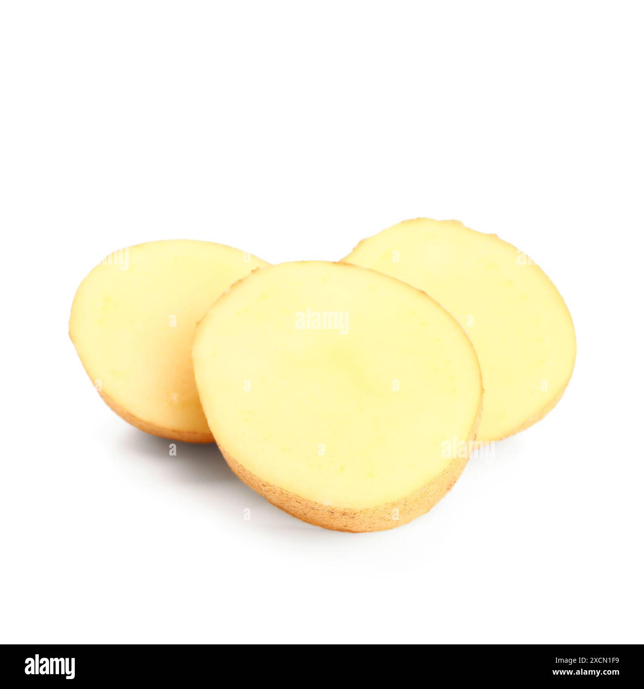 Slices of fresh raw potato on white background Stock Photo - Alamy