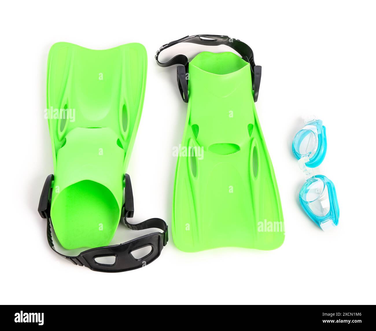 New swimming goggles and flippers on white background Stock Photo - Alamy