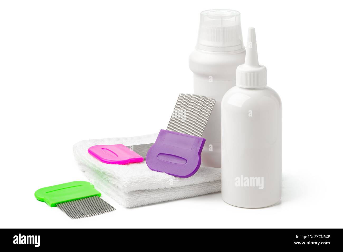 Comb, anti lice medicine and towel on white background Stock Photo - Alamy